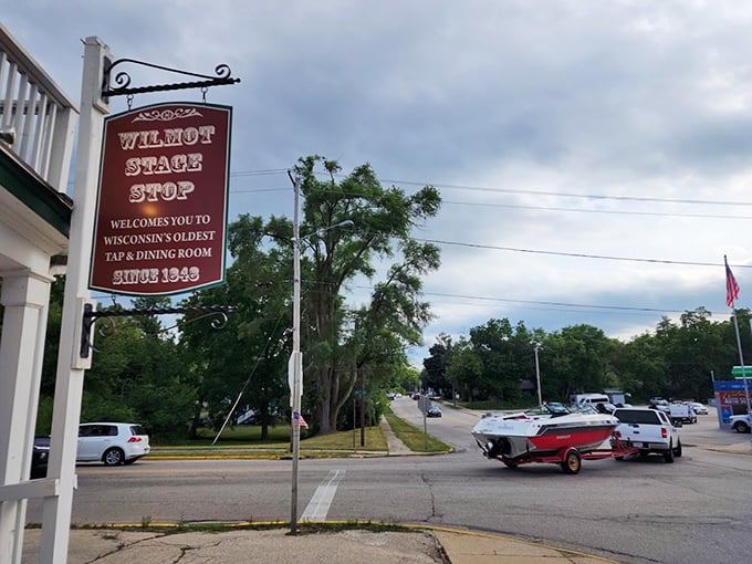 Small town, big charm! The Wilmot Stage Stop's exterior view is like a Norman Rockwell painting come to life, complete with classic cars.