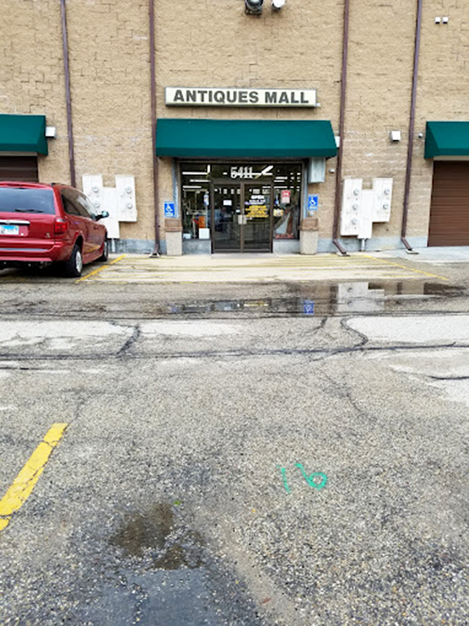 Parking lot to paradise! Don't let the humble exterior fool you – beyond those doors lies a wonderland of whimsy and nostalgia.