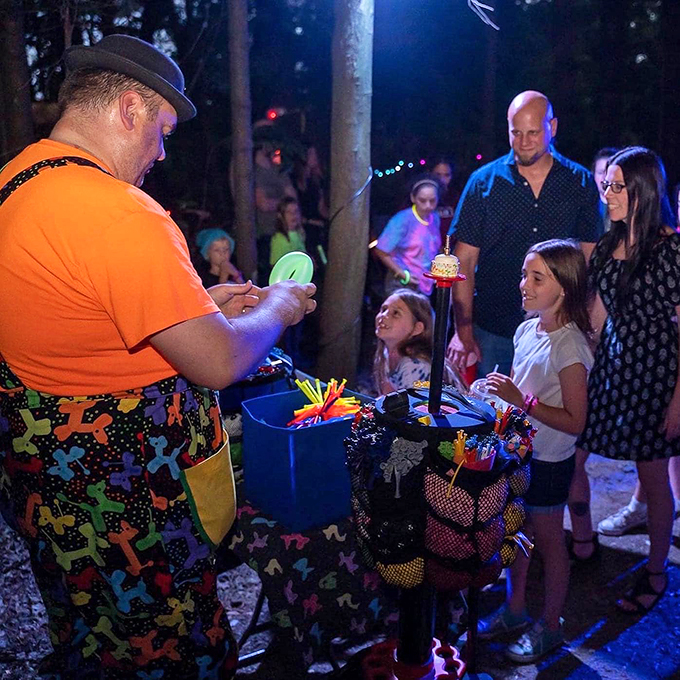 The Candy Man can! This colorful character seems to be dishing out glowsticks like they're going out of style. Rave on!