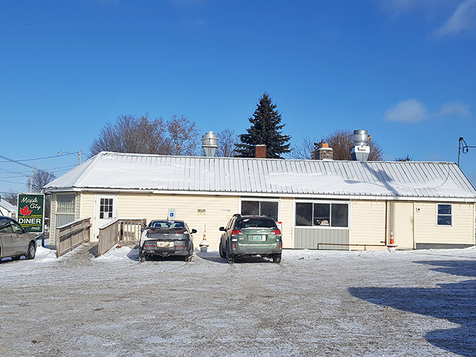 Park your appetite here! This humble exterior is the gateway to a world of culinary delights. Your taste buds will thank you for the pit stop.