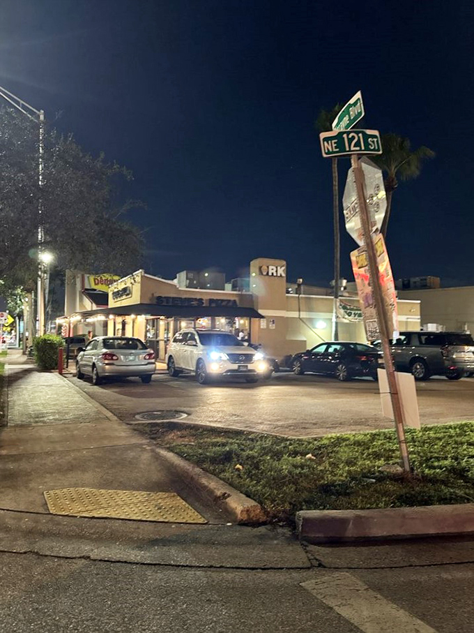 Even at night, Steve's Pizza shines like a beacon for the hungry. It's not just a parking lot; it's a field of pizza dreams.