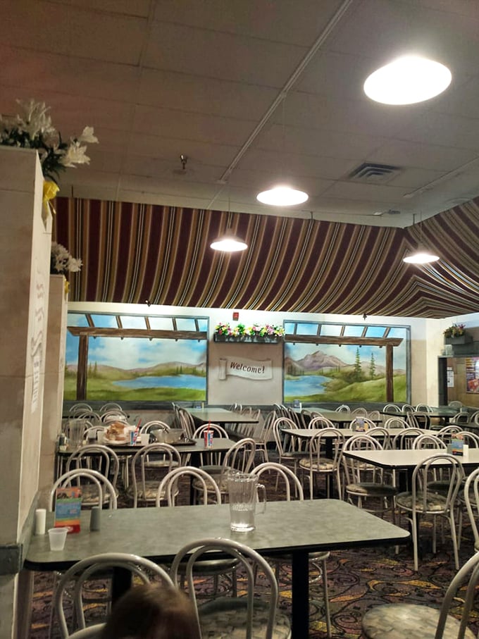 After battling dragons and conquering the arcade, refuel in this oasis of family-friendly fare. The murals say "rustic retreat," but the menu screams "pizza party paradise!"