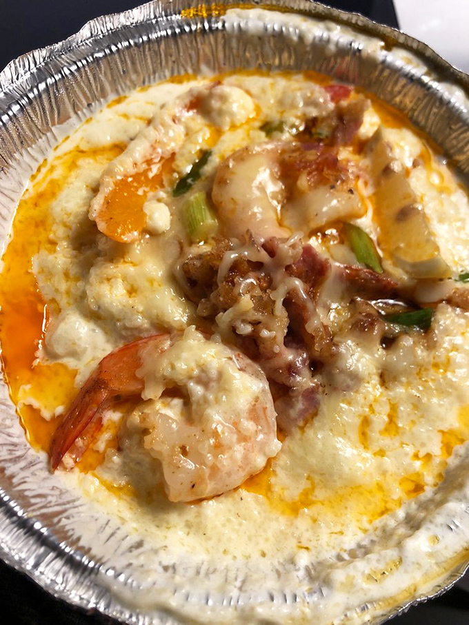 Shrimp and grits: the South's gift to seafood lovers everywhere. It's like a warm, cheesy hug with a sprinkle of oceanic delight. Comfort food? More like bliss in a bowl!
