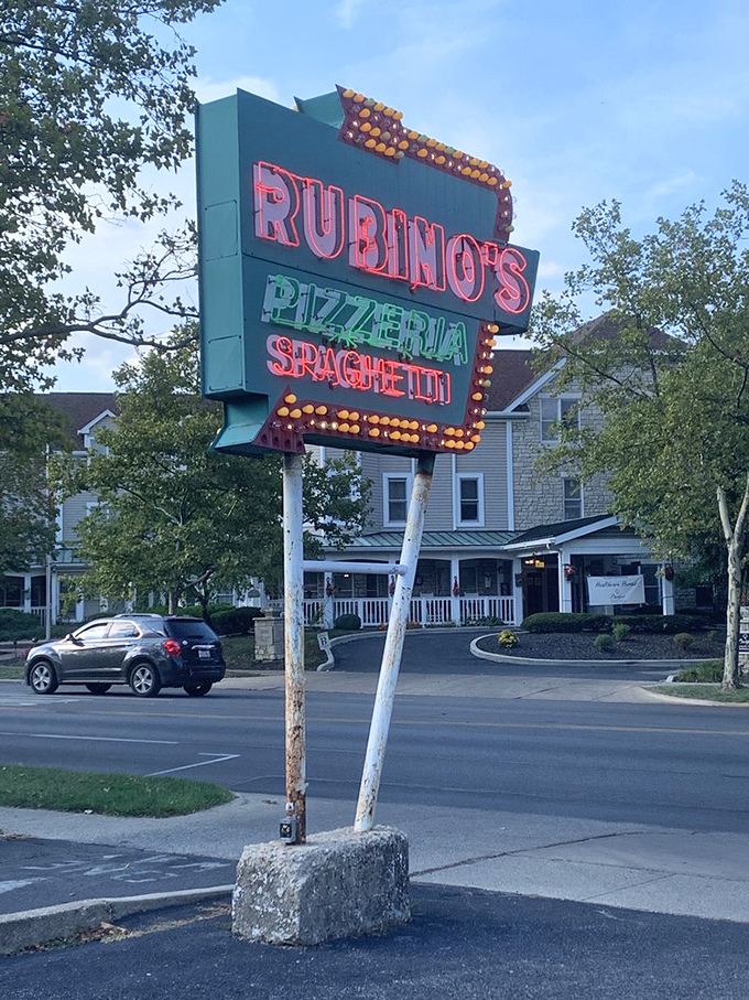 Lights, camera, pizza action! Rubino's sign is the bat signal for carb enthusiasts and cheese aficionados alike.