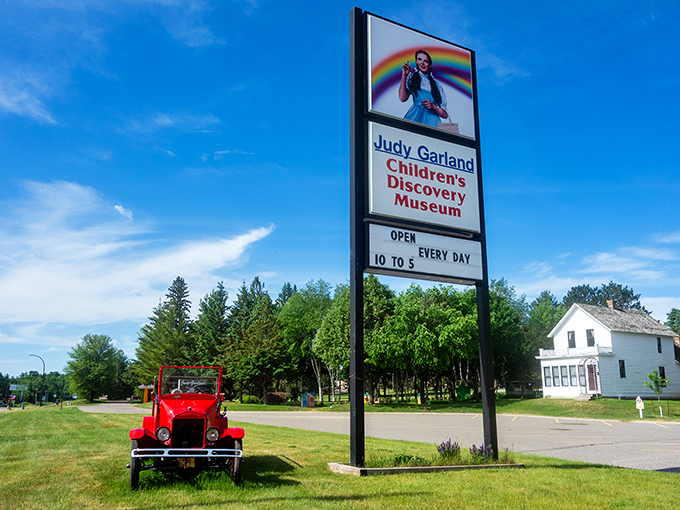 The sign says it all: a rainbow of discovery awaits! Just watch out for flying monkeys on your way in.