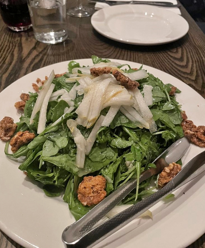 A salad that's anything but boring! Fresh, crisp, and dotted with what looks like candied nuts, this plate proves that Italians know how to make even greens exciting.