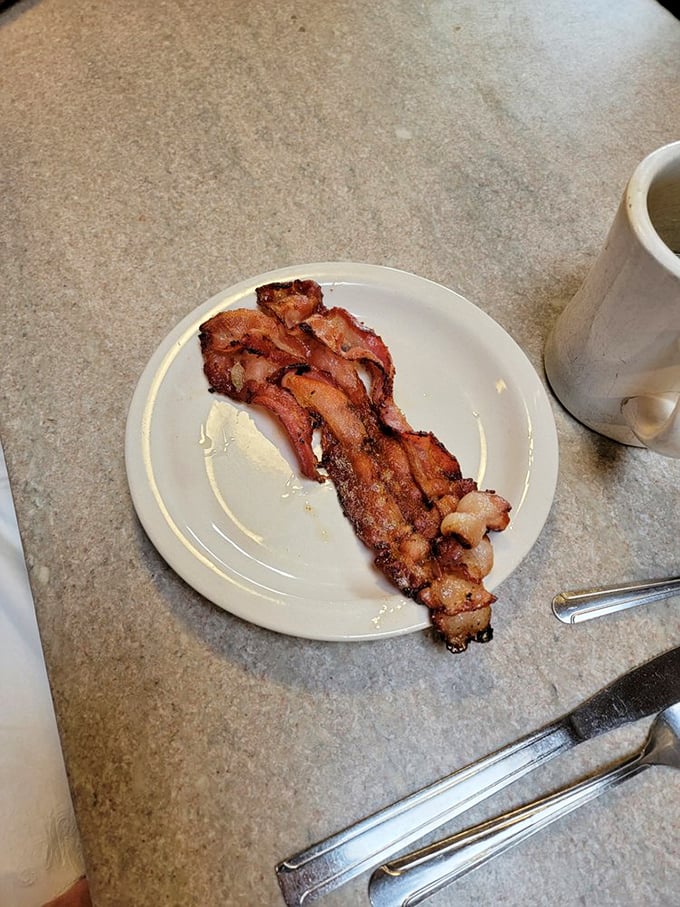 Bacon: nature's candy. Crispy, smoky, and irresistible &ndash; it's the breakfast side that thinks it's the main event. And at Franks Diner, it just might be!