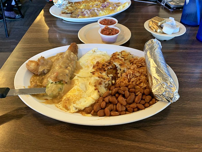 Spice up your life! This chile relleno plate is a fiesta on a dish, proving that sometimes the best things in life come wrapped in a tortilla.