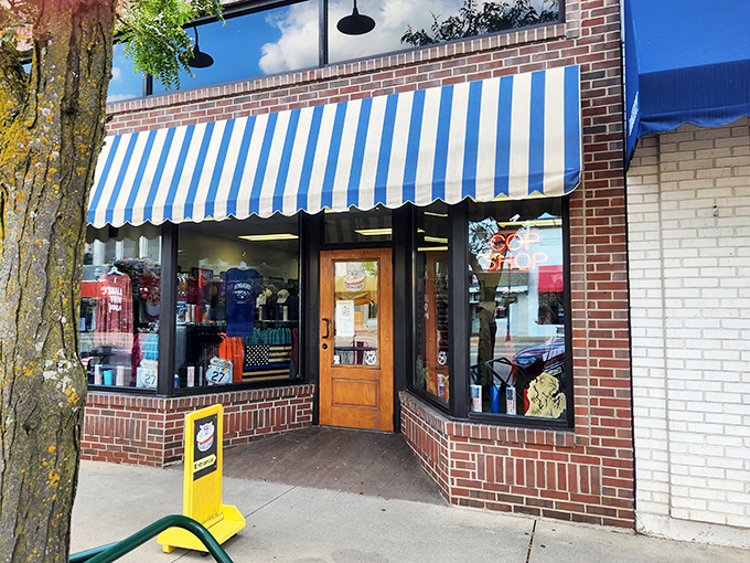 The gateway to gastronomic bliss! This charming storefront, with its striped awning, promises a world of sweet indulgence just beyond its threshold.