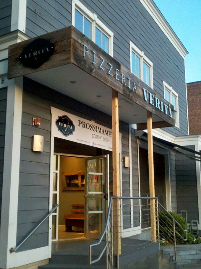 Pizza pilgrims, your journey ends here! Pizzeria Verit&agrave;'s entrance is like the pearly gates of cheese heaven. Leave your diet at the door and prepare for carb-loaded bliss.