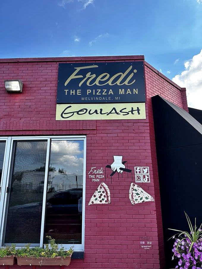 A sign from above... or at least from the building facade! Fredi's exterior signage is like a bat signal for pizza lovers, calling all hungry heroes to assemble.