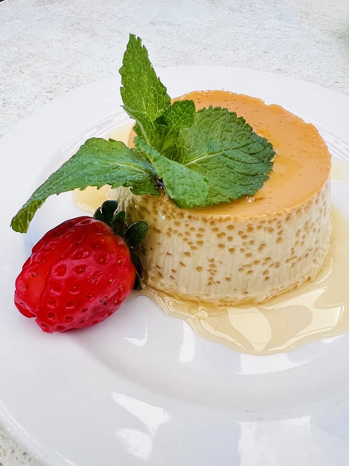 Flan so smooth, it makes silk feel jealous. This dessert isn't just a treat; it's a silky, caramel-kissed journey to sweet tooth nirvana.