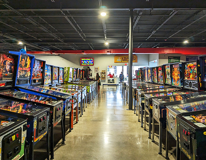 A sea of pinball machines as far as the eye can see. It's like Willy Wonka's factory, but for grown-ups who never quite grew up.