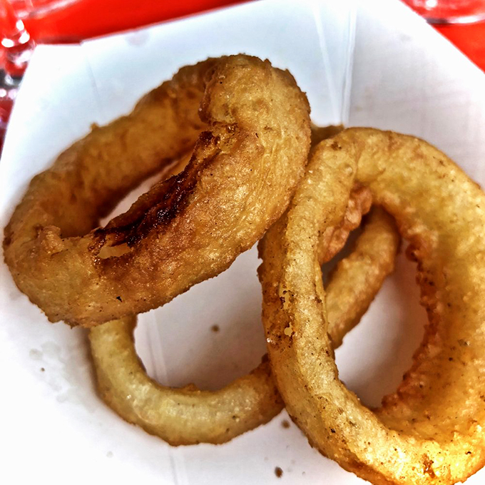 Onion rings or edible halos? These golden circles of joy are so perfectly crisp, they might just make you religious about fried food.