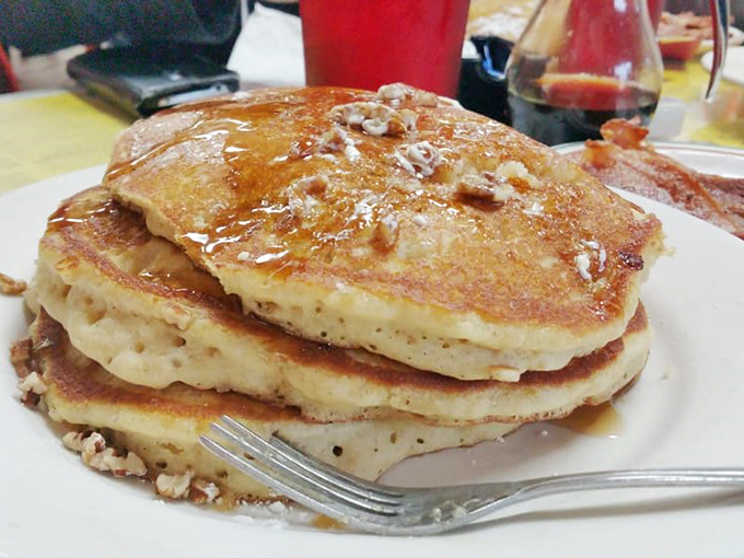 Stack 'em high, watch 'em fly! These pancakes are so fluffy, they might float away if not weighed down by generous lashings of syrup and butter.