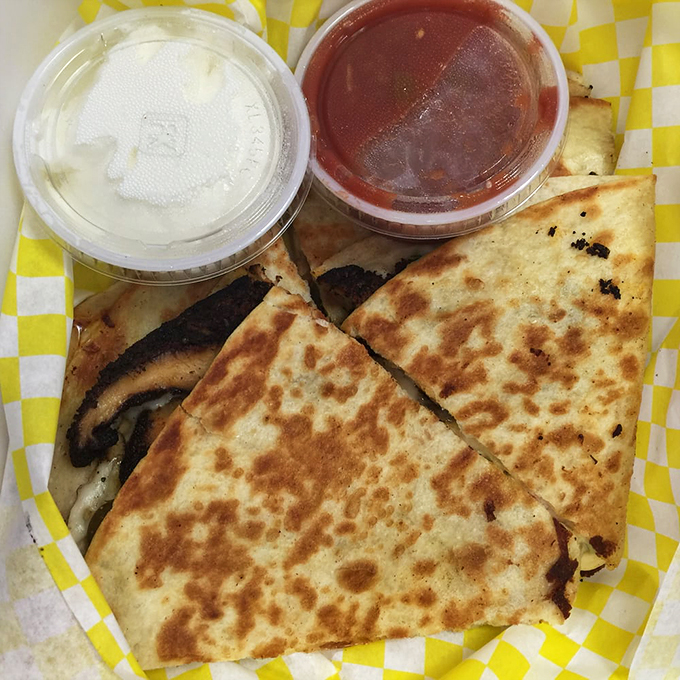 The quesadilla that took a detour through the French Quarter! This crispy, cheesy delight proves that fusion cuisine can be oh-so-right.