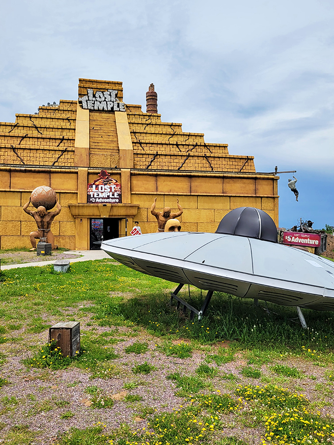 Ancient temple meets Area 51. Is that flying saucer the world's first food truck, delivering cosmic cheese curds to hungry explorers?