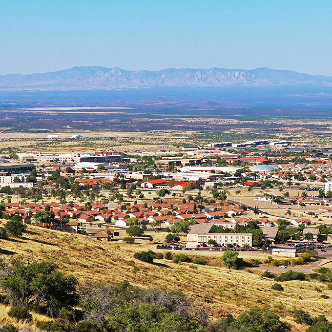 Red-roofed homes dot the landscape like confetti, showing how civilization and nature strike a perfect balance.