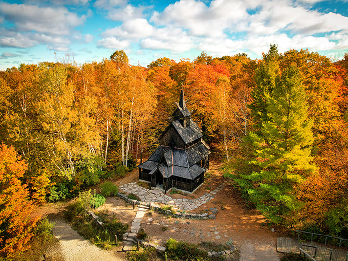 A bird's eye view of bliss! This aerial shot showcases the Stavkirke in all its autumnal glory, like a medieval jewel in a golden crown.
