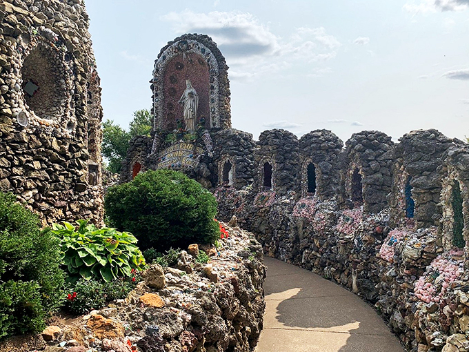 The yellow brick road's got nothing on this stony trail. It's like walking through a geologist's dream journal, with a dash of religious fervor thrown in for good measure.