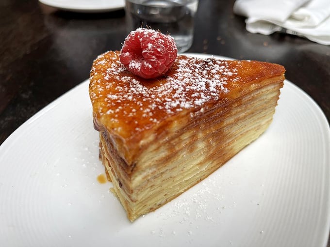 Behold, the Leaning Tower of Crepe-sa! This vanilla crepe stack is so perfectly layered, it could teach geometry classes on the side.