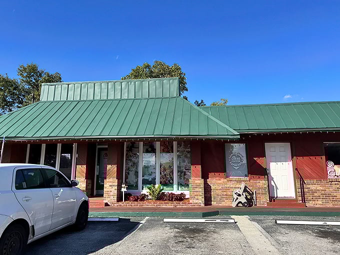 A green-roofed oasis of carbs! Alessi's exterior promises a world of flaky, buttery delights waiting just beyond those brick walls.