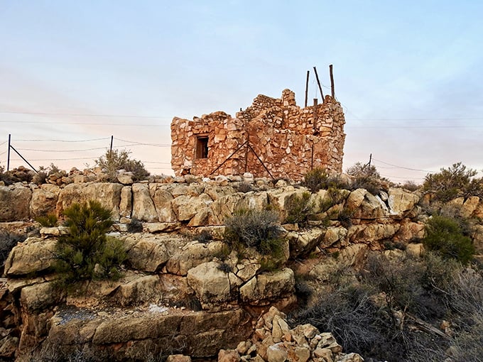 Ruins with a view! This crumbling stone structure tells tales of a Wild West gone wilder.
