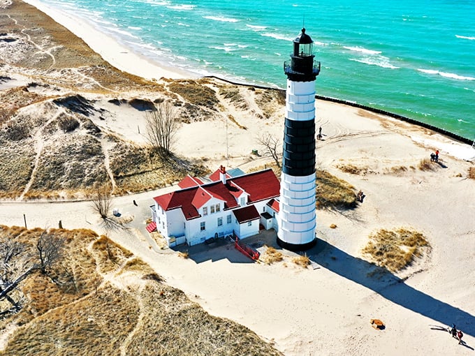 Zebra of the shoreline! This black-and-white beauty stands tall, guarding Lake Michigan like a dapper doorman of the Great Lakes.