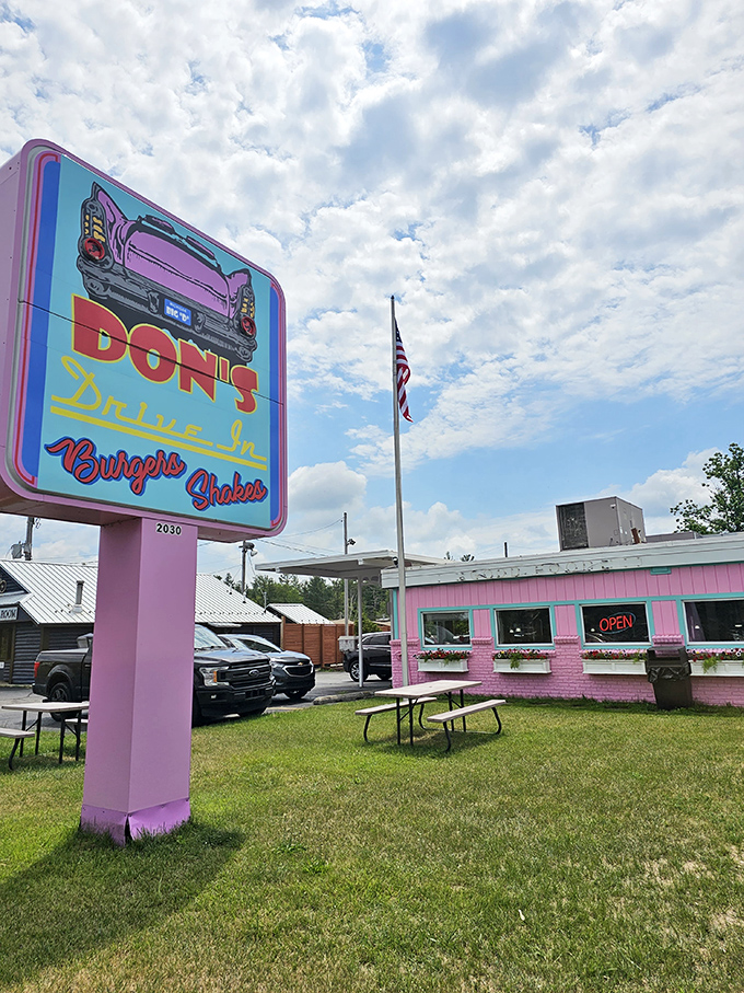 Don's Drive-In: A pink paradise that's more inviting than grandma's kitchen! This retro gem serves up nostalgia with a side of neon-lit charm.