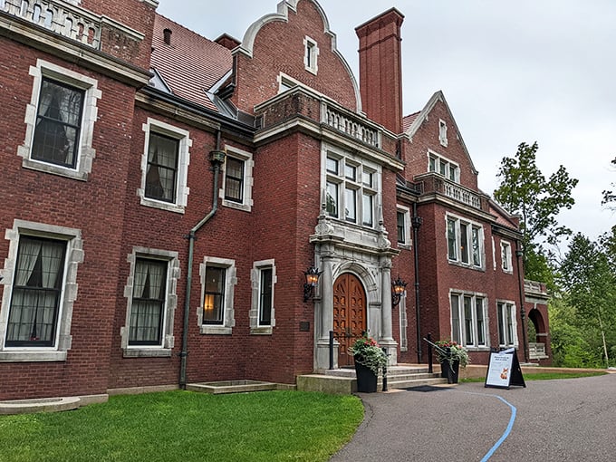 Glensheen Mansion's imposing brick facade hides dark secrets behind its elegant exterior. Even on sunny days, shadows seem to linger longer here.