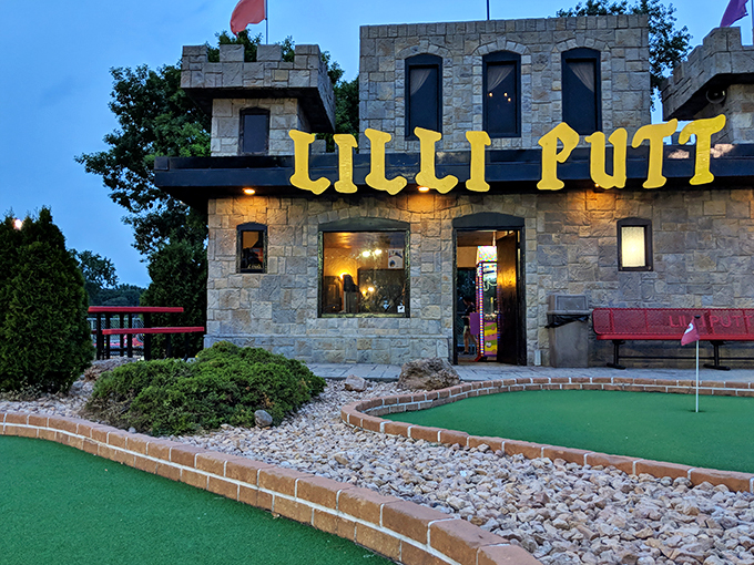 Putt-putt paradise! Lilli Putt's castle beckons mini-golfers to test their skills amidst whimsical obstacles and neon dreams.