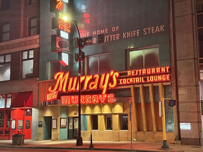 Neon dreams and butter knife dreams! Murray's iconic sign promises a steak so tender, it practically melts at the sight of a fork.