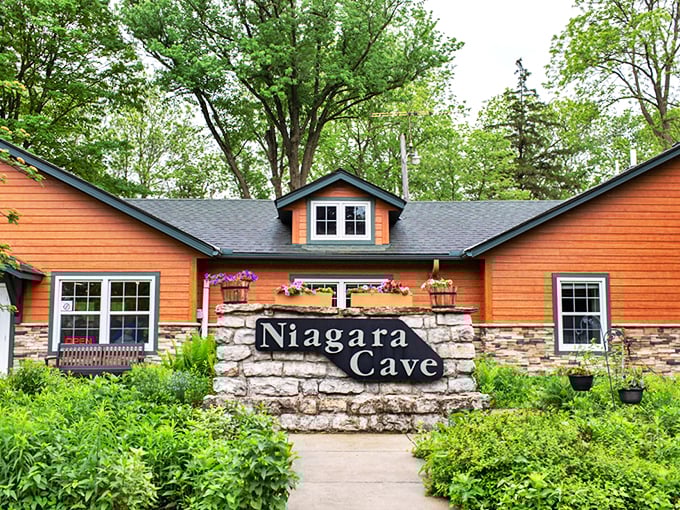 Welcome to Niagara Cave! This charming orange facade is like a Wes Anderson set come to life, hiding subterranean wonders beneath.