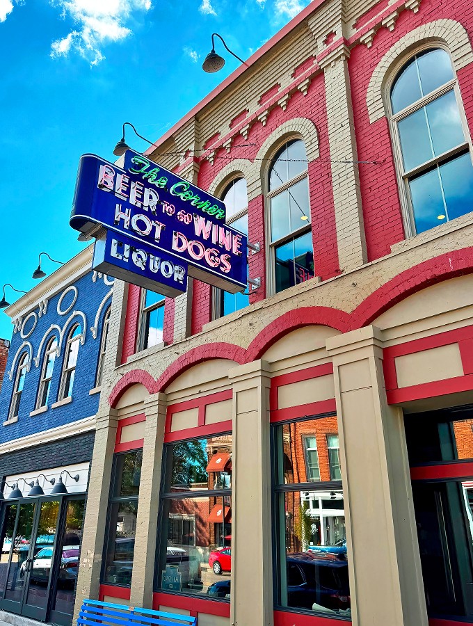 Pit stop perfection! This neon beacon guides weary travelers to a hot dog haven that's been comforting souls since 1935.