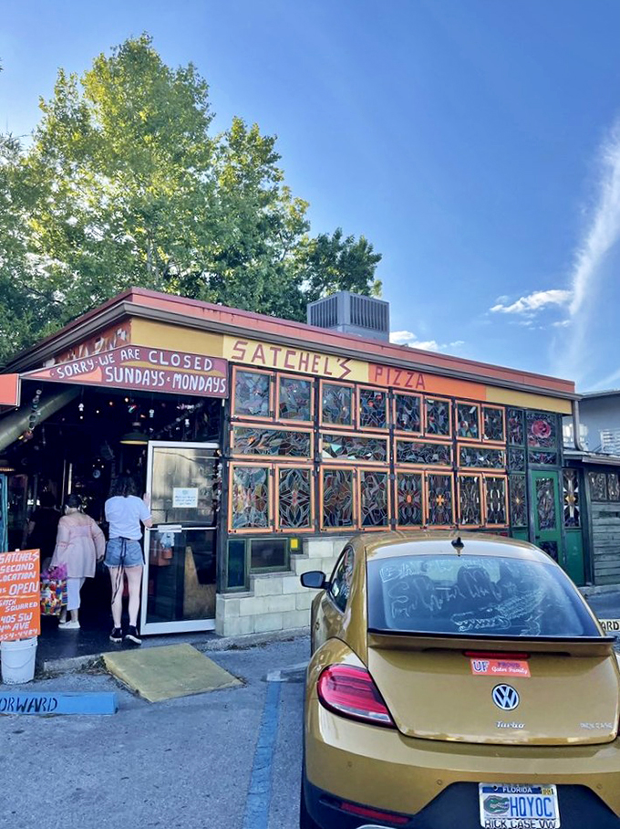 Stained glass meets pizza paradise! Satchel's exterior is like a Grateful Dead album cover come to life.