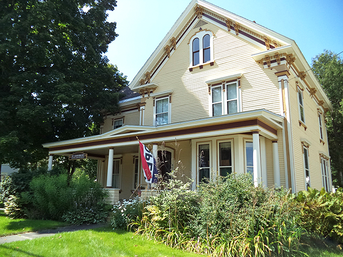 Victorian charm meets local lore! This sunny yellow house is bursting with stories, like your grandma after her third cup of coffee.