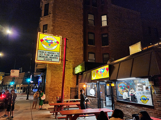 Welcome to the snark-filled oasis of late-night cravings! The Wiener's Circle's neon glow beckons hungry souls like a culinary lighthouse.