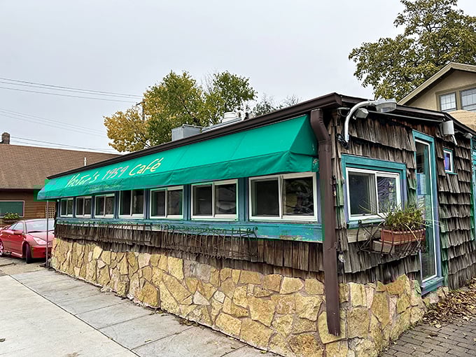 Step into a Cuban time capsule! Victor's 1959 Cafe's vibrant turquoise awning promises a fiesta for your taste buds.
