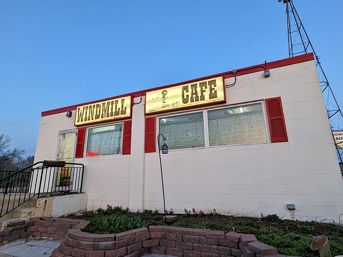Quaint charm alert! This little cafe spins up breakfast magic faster than its rooftop windmill.