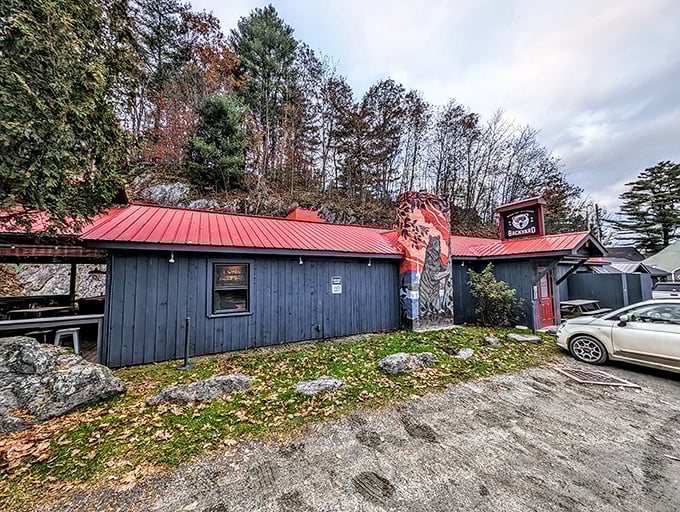 Blue exterior, red trim, and a promise of deliciousness within. Backyard is where comfort food meets Vermont's natural beauty.