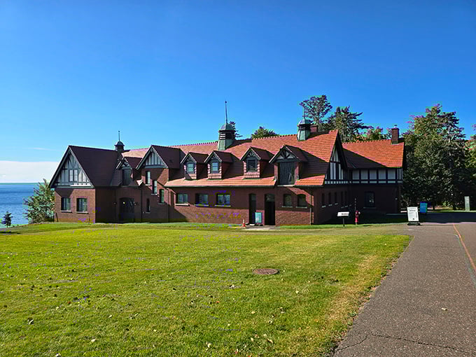 The Tudor-style lakeside view of Glensheen presents a peaceful scene that belies the mansion's troubled past. Lake Superior's waters keep silent about what they've witnessed.