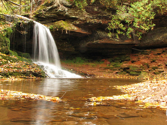 Shhh... Lost Creek Falls is the introvert of waterfalls. Tucked away in lush greenery, it's like finding a secret oasis in Wisconsin's northwoods.