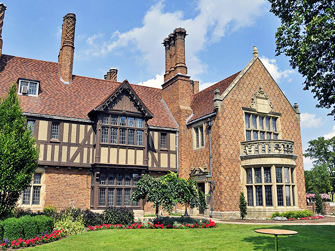 Grand entrance alert! Meadow Brook's manicured gardens and towering chimneys scream "old money" louder than a Monopoly banker.