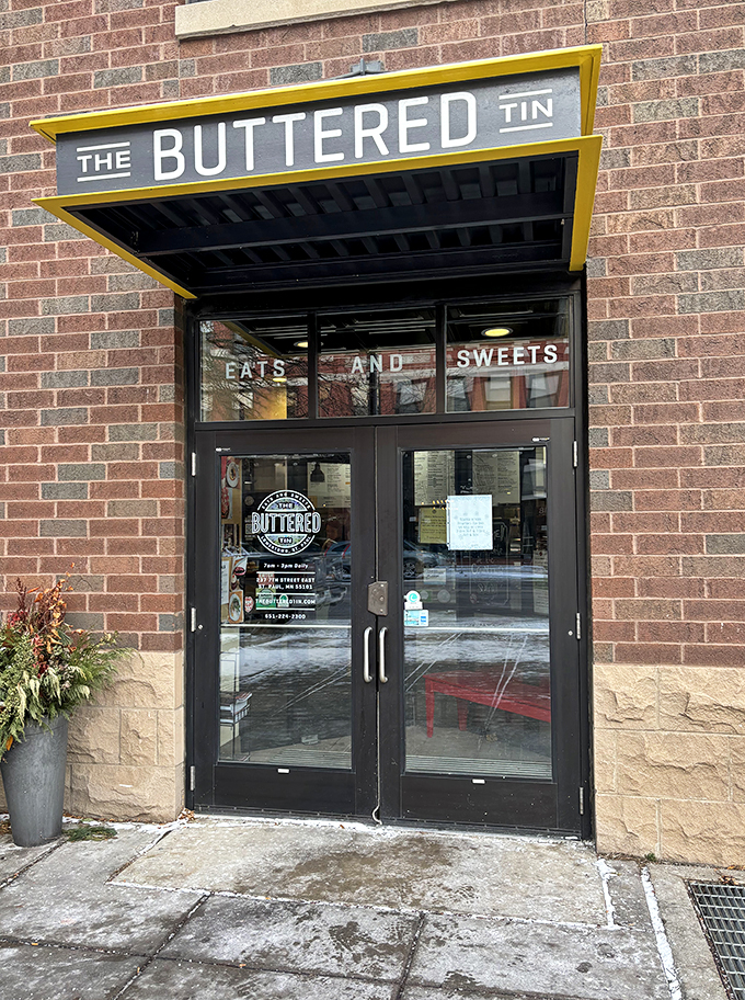 The Buttered Tin: Where "eats and sweets" isn't just a slogan, it's a way of life. This storefront screams comfort food!