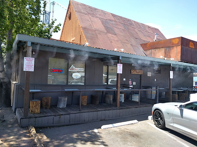 Smoke signals of deliciousness! Watch your burger sizzle on the open grill, a mouthwatering show that beats any 4K TV.