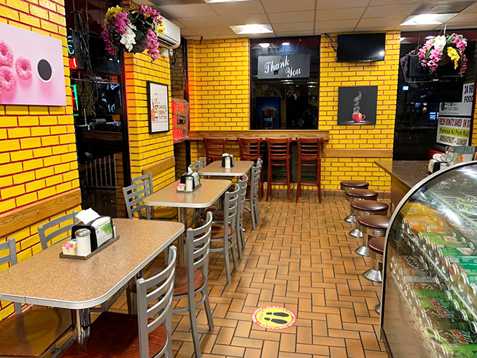 Sunshine yellow walls and cozy booths – it's like being hugged by a giant lemon meringue pie. Comfort food paradise, anyone?