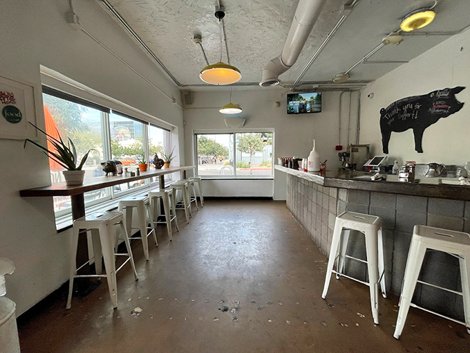 Step into breakfast heaven! This cozy nook feels like your coolest friend's kitchen, complete with a pig-shaped chalkboard menu.