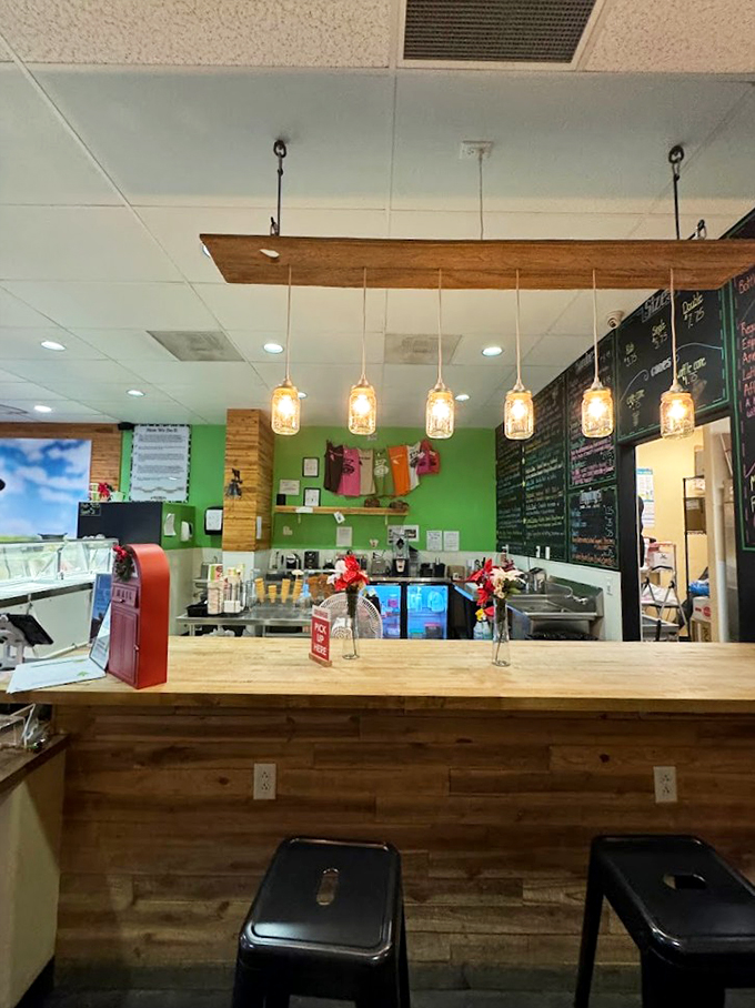 Step into a world where Edison bulbs illuminate ice cream dreams. This counter is where magic happens, one scoop at a time.