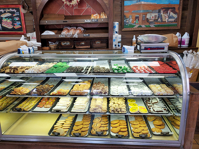 Pastry paradise or carb-lover's dream? This display case is a kaleidoscope of confections that would make Willy Wonka hang up his hat and reach for a guava pastry.