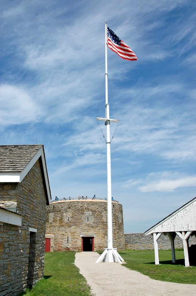 Old Glory waves hello, standing tall against Minnesota's big sky. This flagpole could give the Statue of Liberty a run for her money in the "patriotic landmarks" department!